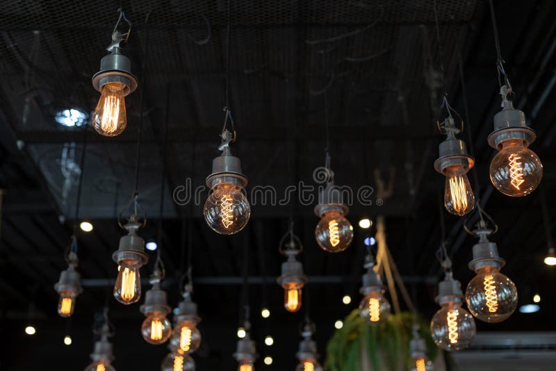 Vintage Style Light Bulb in a Cafe Shop Stock Photo - Image of abstract ...