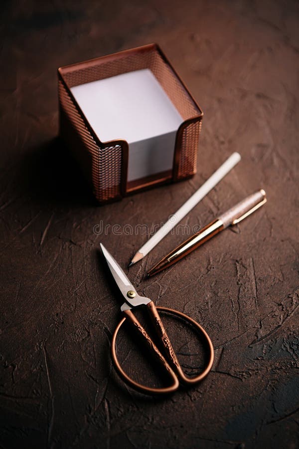 Office Utensils in Vintage Style on a Rustic Background. Scissors, Pen ...