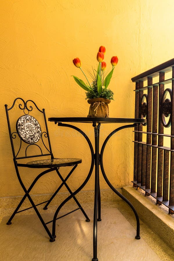 Vintage Table and Chair on Relaxing Terrace. Stock Photo - Image of ...