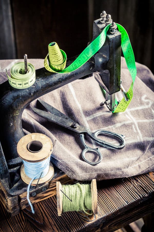 Vintage Tailor`s Machine, Scissors, Cloth and Threads Stock Photo ...