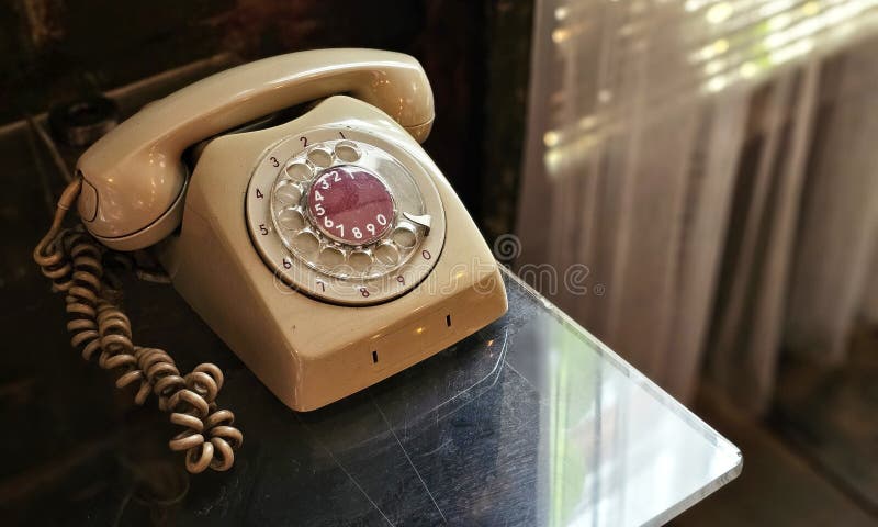 Vintage Telephone on the Glass Table. Stock Photo - Image of aged ...