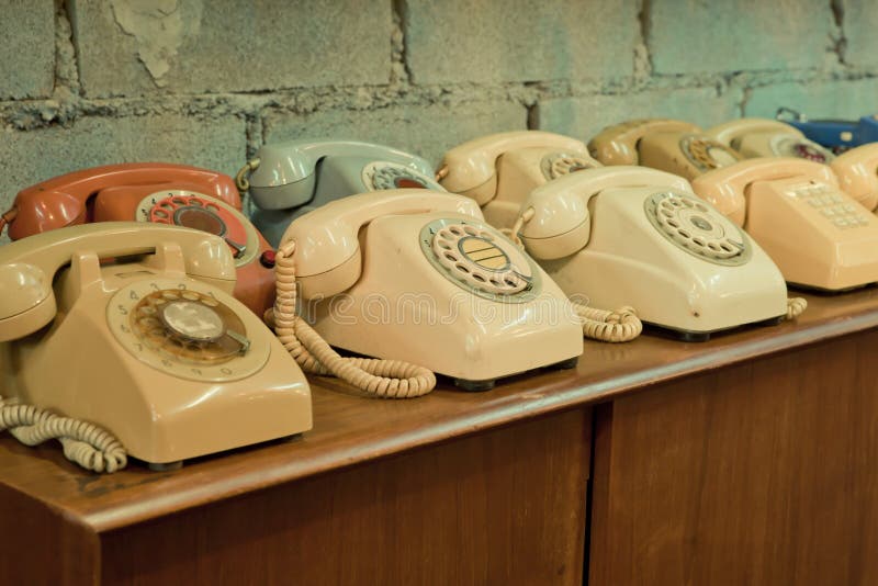 Vintage Telephones on the Table Stock Image - Image of antiquated ...