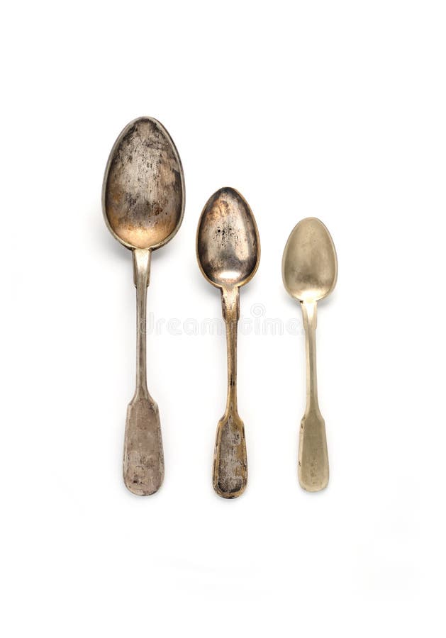Vintage Three Spoons of Different Sizes on a White Background Stock ...