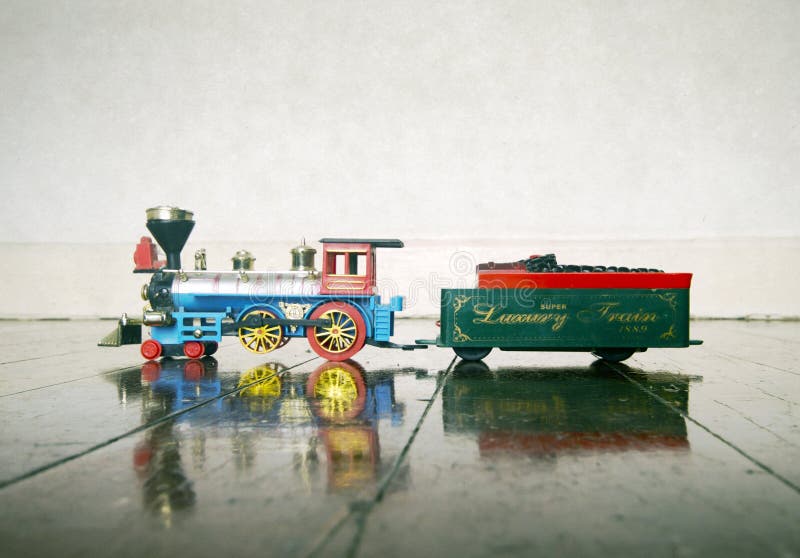 Vintage Toy Train and Wagon on a Wooden Floor Stock Image - Image of ...