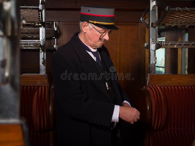 Vintage Train Conductor in Antique Train Stock Image - Image of ...