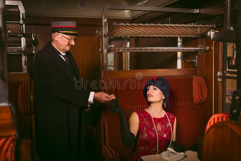 Vintage Train Conductor in Old Steam Train Stock Image - Image of ...