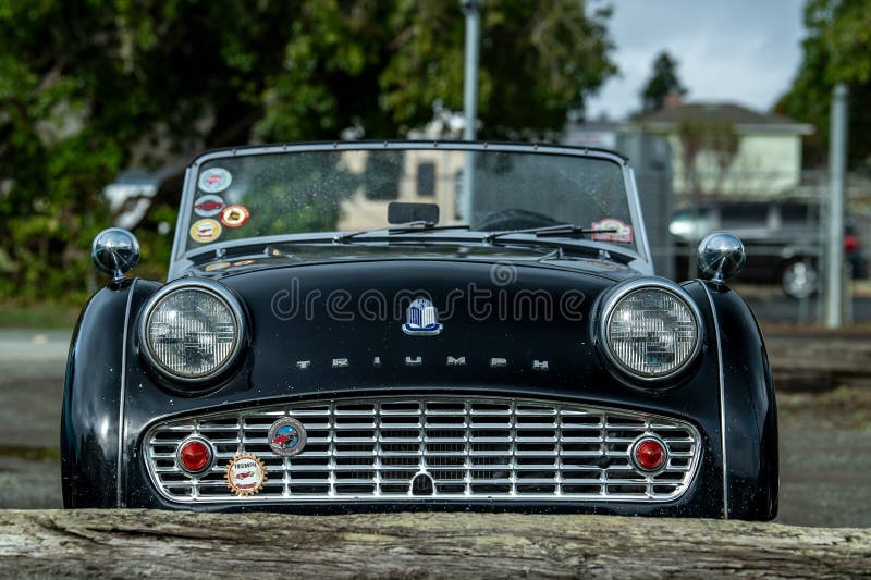 Vintage Triumph Spitfire Car Parked Behind a Log Editorial Stock Image ...