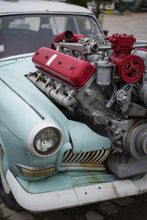 Vintage Tuned Car, with a Large Engine Sticking Out of Its Hood Stock ...