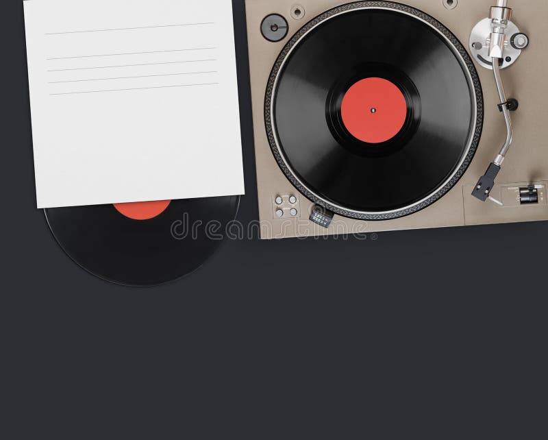 Old Vintage Turntable with Vinyl Records on a Wooden Table. Top View ...