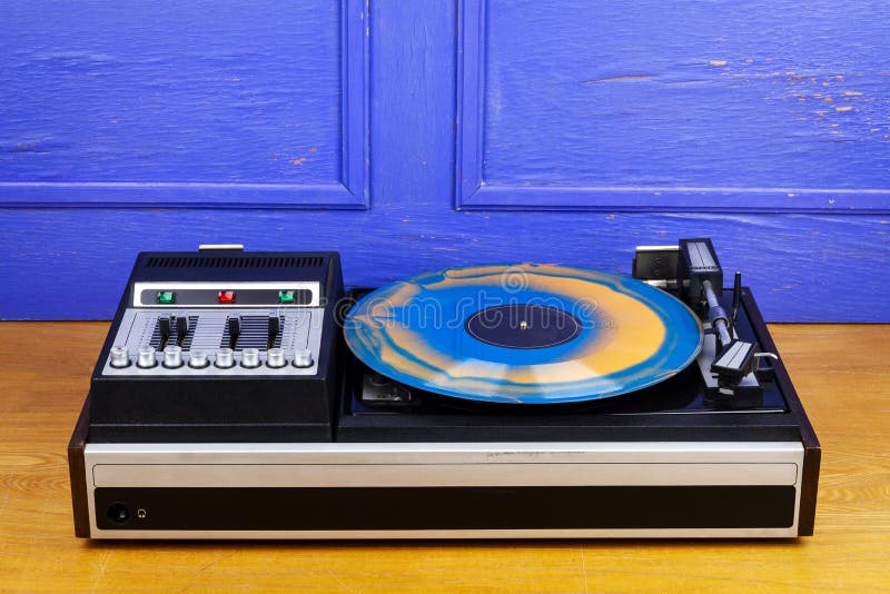 Vintage Turntable Vinyl Record Player with Blue and Orange Vinyl Stock ...