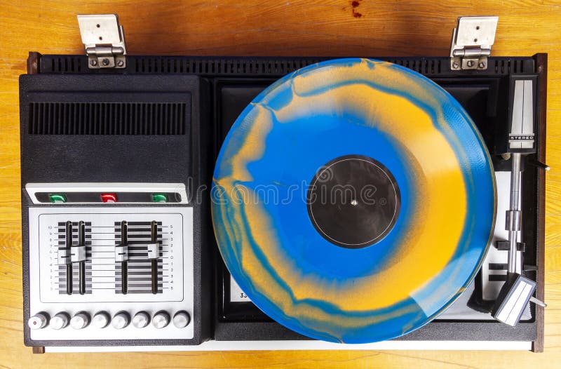 Vintage Turntable Vinyl Record Player with Blue and Orange Vinyl Stock ...