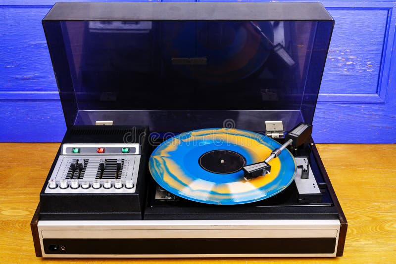Vintage Turntable Vinyl Record Player with Blue and Orange Vinyl Stock ...