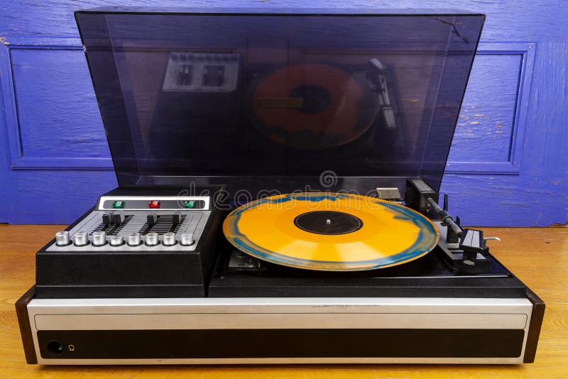Vintage Turntable Vinyl Record Player with Blue and Orange Vinyl Stock ...