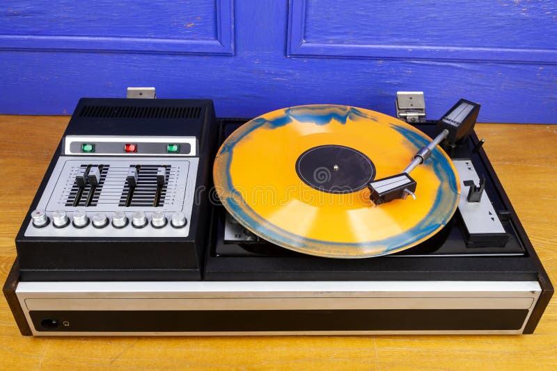 Vintage Turntable Vinyl Record Player with Blue and Orange Vinyl Stock ...