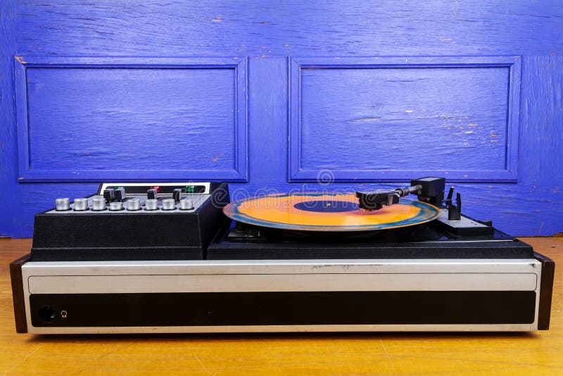Vintage Turntable Vinyl Record Player with Blue and Orange Vinyl Stock ...