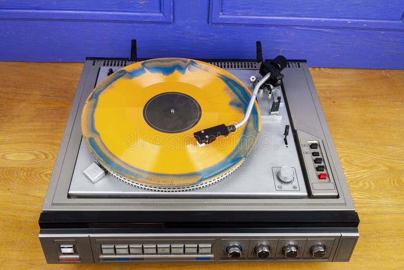 Vintage Turntable Vinyl Record Player with Blue and Orange Vinyl Stock ...