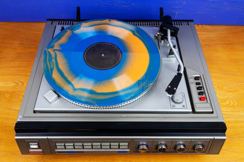 Vintage Turntable Vinyl Record Player with Blue and Orange Vinyl Stock ...