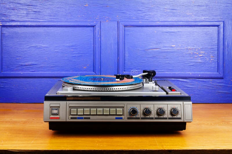 Vintage Turntable Vinyl Record Player with Blue and Orange Vinyl Stock ...