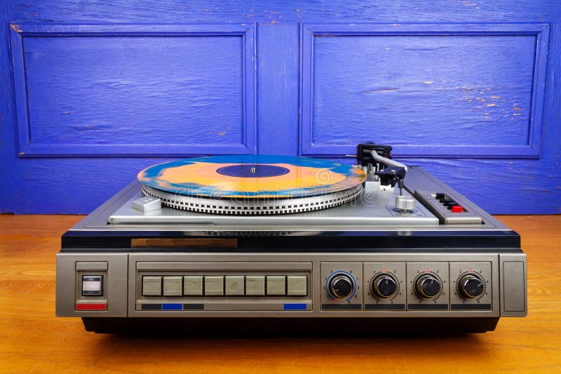 Vintage Turntable Vinyl Record Player with Blue and Orange Vinyl Stock ...