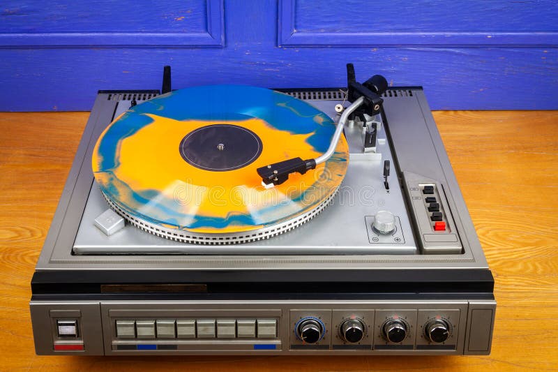 Vintage Turntable Vinyl Record Player with Blue and Orange Vinyl Stock ...