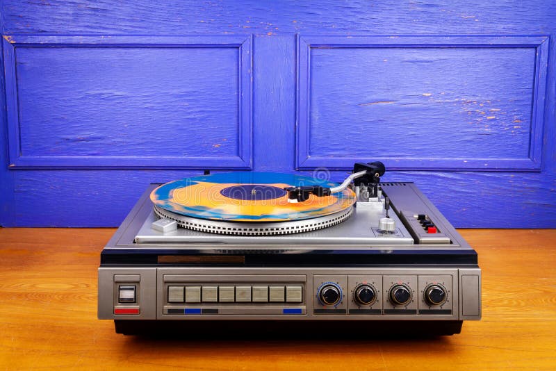 Vintage Turntable Vinyl Record Player with Blue and Orange Vinyl Stock ...