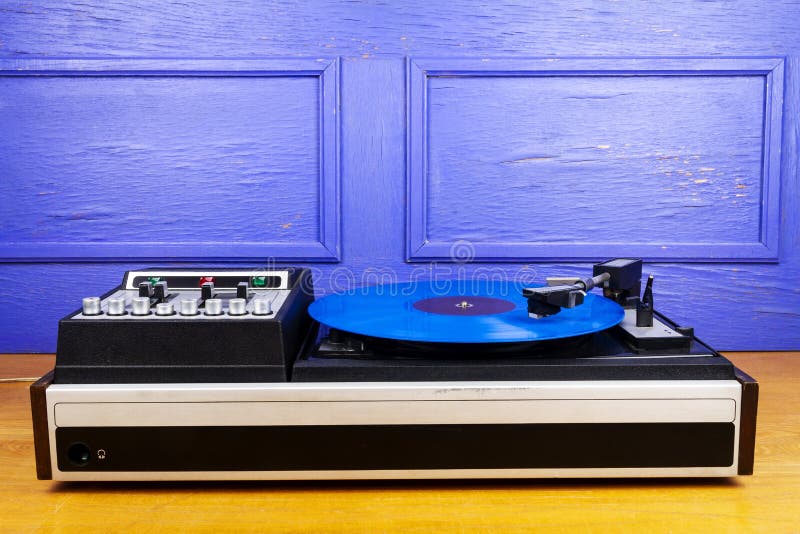 Vintage Turntable Vinyl Record Player with Blue Vinyl Stock Photo ...