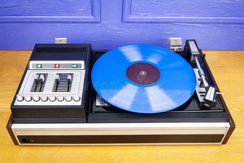 Vintage Turntable Vinyl Record Player with Blue Vinyl Stock Image ...