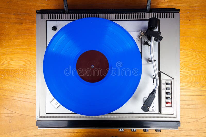 Vintage Turntable Vinyl Record Player with Blue Vinyl Stock Image ...