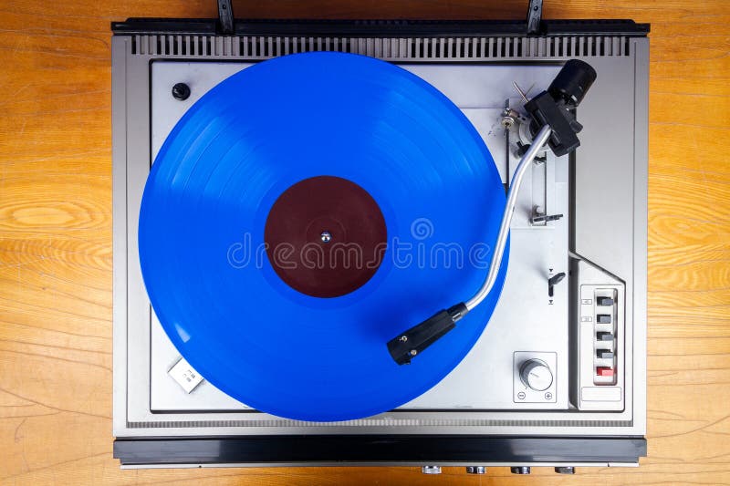 Vintage Turntable Vinyl Record Player with Blue Vinyl Stock Photo ...