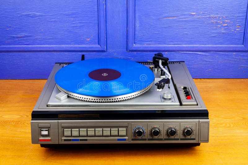 Vintage Turntable Vinyl Record Player with Blue Vinyl Stock Image ...