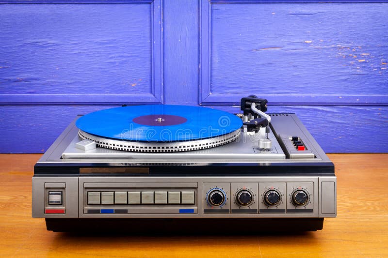 Vintage Turntable Vinyl Record Player with Blue Vinyl Stock Photo ...