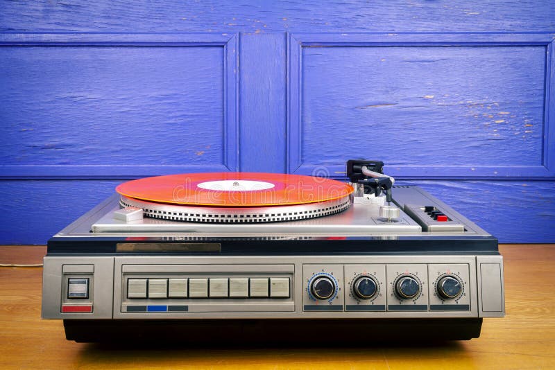 Vintage Turntable Vinyl Record Player with Red Vinyl Stock Photo ...