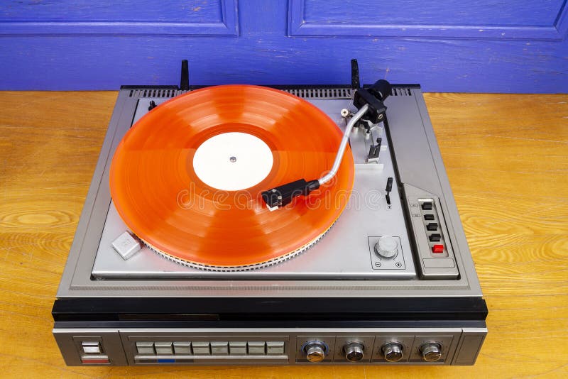 Vintage Turntable Vinyl Record Player with Red Vinyl Stock Photo ...