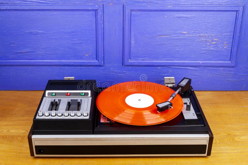 Vintage Turntable Vinyl Record Player with Red Vinyl Stock Photo ...