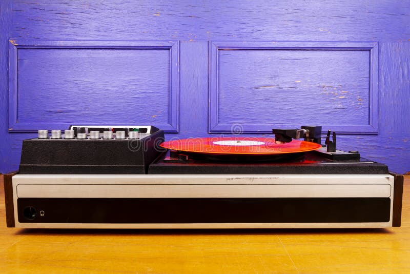 Vintage Turntable Vinyl Record Player with Red Vinyl Stock Photo ...