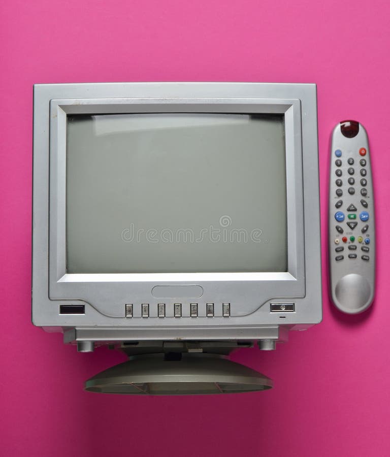 Vintage TV and Remote Control on a Pink Background. Stock Image - Image ...
