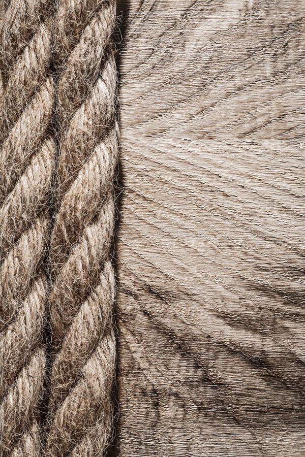 Vintage Twisted Jute Cables on Wooden Board Vertical Image Stock Image ...