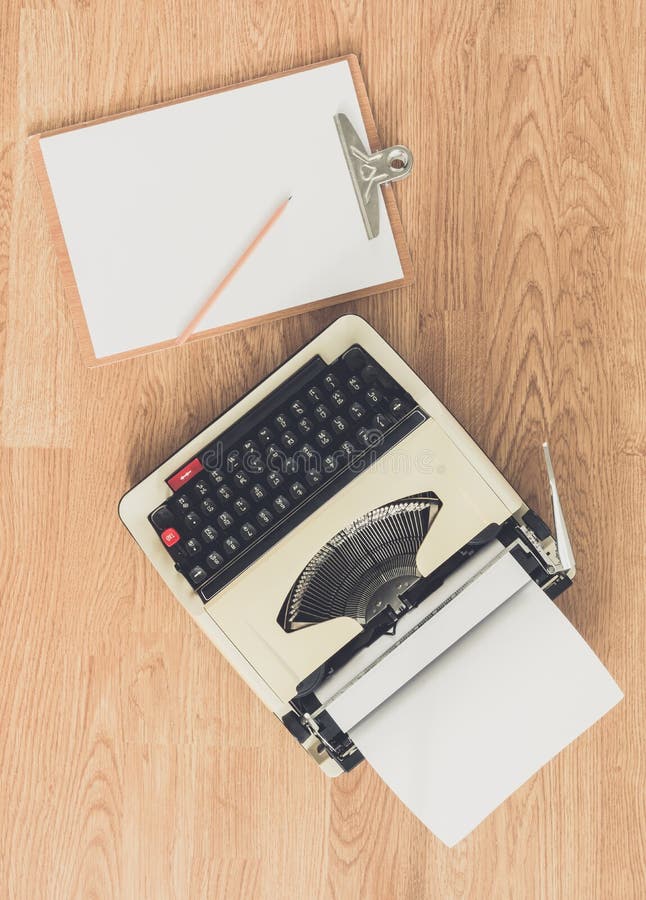 Vintage Typewriter and a Blank Sheet of Paper Stock Image - Image of ...