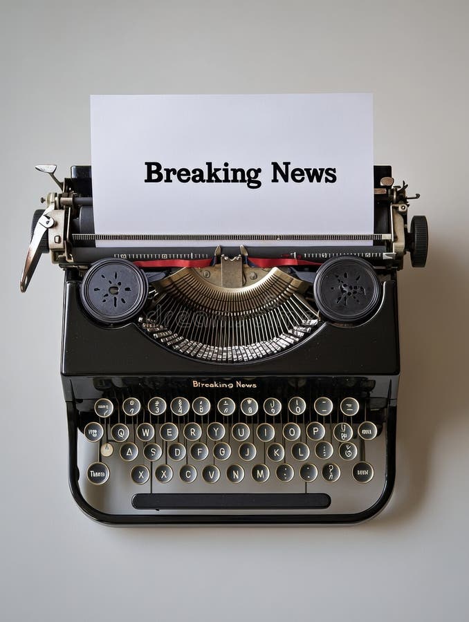 Vintage Typewriter Features Bold Breaking News on Blank Paper in a ...
