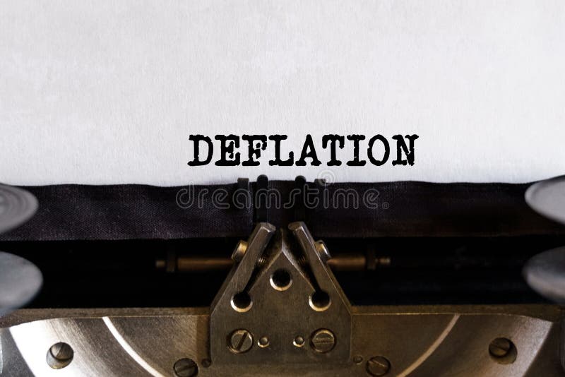 Vintage Typewriter with Printed Text -DEFLATION, on a Sheet of Paper ...