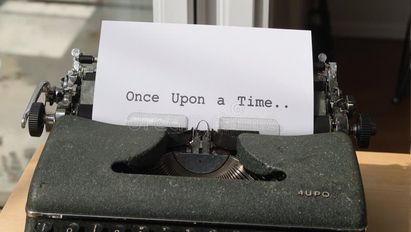 Vintage Typewriter on Sunny Table with Once upon a Time Typed on Paper ...