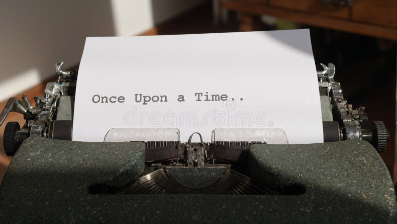 Vintage Typewriter on Sunny Table with Once upon a Time Typed on Paper ...