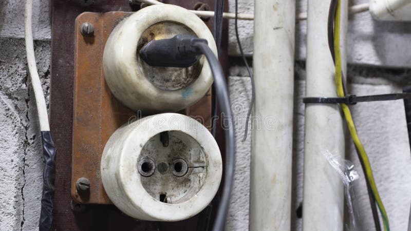 Vintage 220v Sockets on the Wall in the Garage Stock Photo - Image of ...