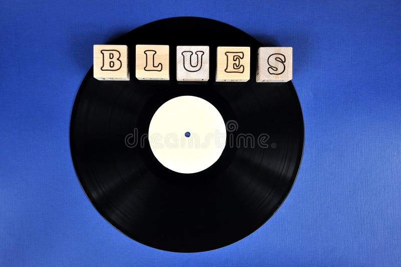 Vintage Vinyl Record on a Blue Background Stock Image - Image of track ...