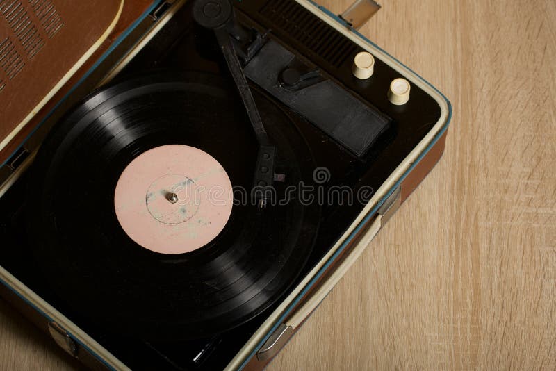Vintage Vinyl Record Player. the Vinyl Record is Spinning Stock Photo ...