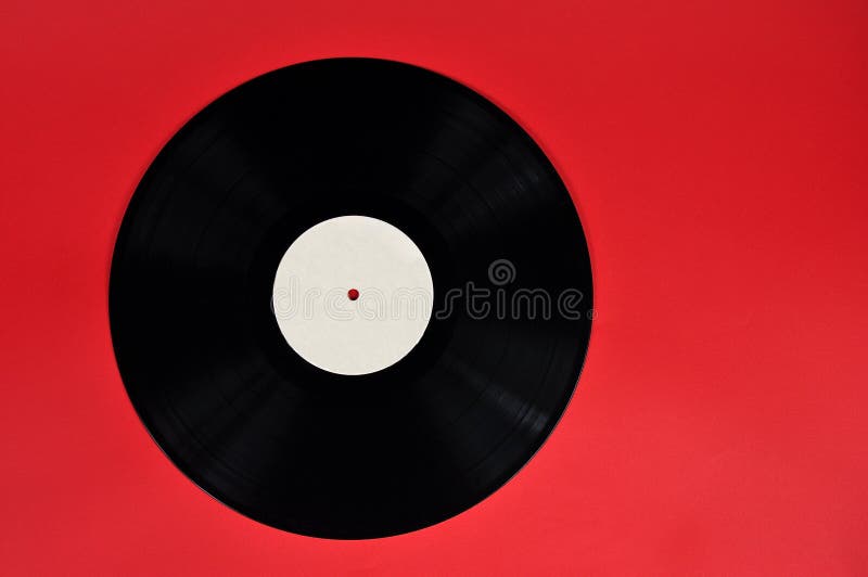 Vintage Vinyl Record on a Red Background Stock Photo - Image of track ...
