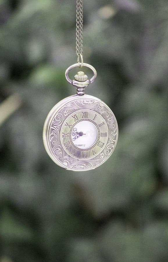 Vintage watch on a chain. stock photo. Image of closeup - 110372114