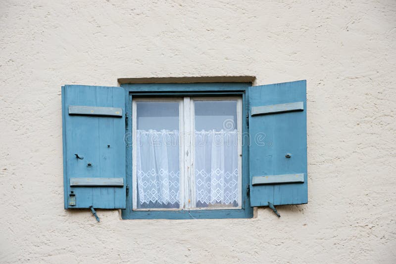Vintage Window with Blue Shutters and White Curtains Stock Photo ...