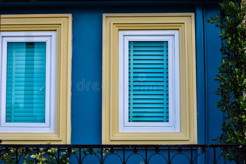 Vintage Windows on the Blue Wall Stock Photo - Image of background ...