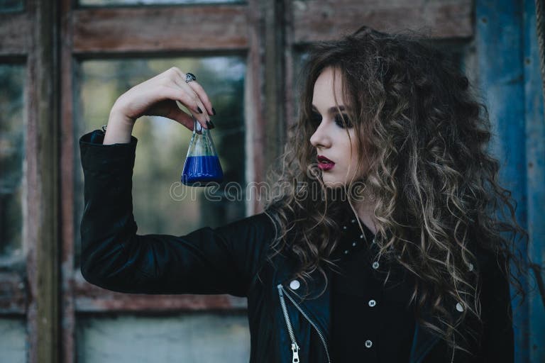 Vintage Witch with Elixir in Hand Stock Photo - Image of harridan ...
